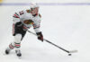 How Blackhawks' Oliver Moore Is Progressing at Training Camp - The ...