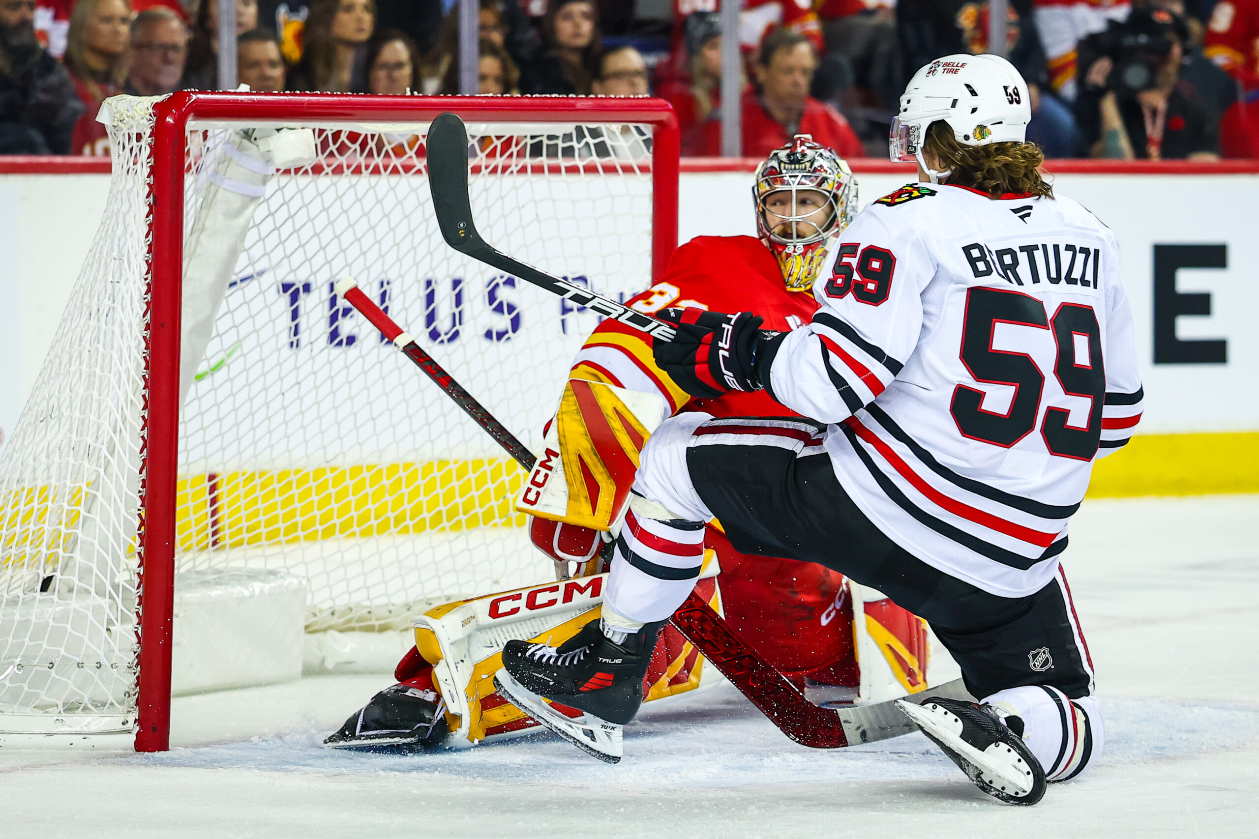 Blackhawks Shut Out Flames as Bedard Leads With 4 Points - The Hockey ...